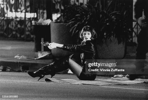 American Actress Traci Lords Wearing Knee High Boots Leather Jacket