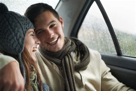 Love Raining And Couple In Car For Road Trip Together Laughing On Date For Travel Vacation Or
