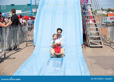 Justin Trudeau Riding Down Slide Editorial Image Image Of Poses Selfie 126170530