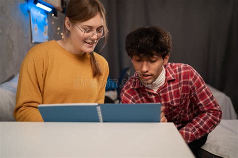 College Student Asking Girlfriend To Help His With Math Homework