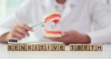 Dentist Cleans Teeth Of Artificial Jaw Model Word Sensitive Teeth Stock Footage Video Of