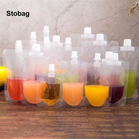 Stobag 투명 마시는 액체 노즐 백 주스 음료 포장 투명 플라스틱 보관 휴대용 밀봉 파우치 100 개