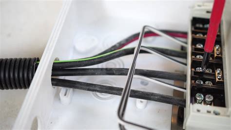 Electrician Hands Installing Domestic Energy System Counter Shutdown