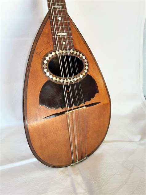 Mandolini Jewelry At Adam Goudeau Blog