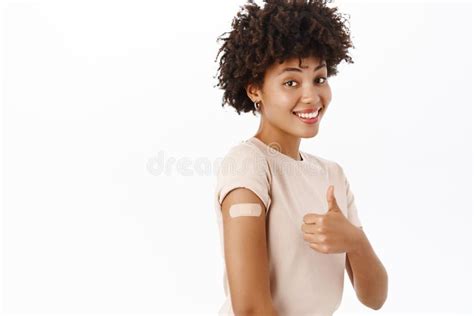 Smiling Black Girl Pointing Finger At Banner Shows Advertisement On