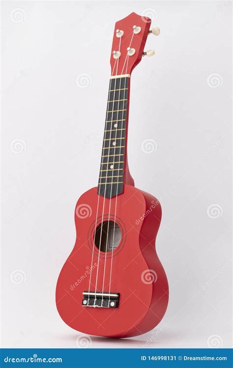 Red Ukulele With White Strings Stock Image Image Of Instrument Musical 146998131