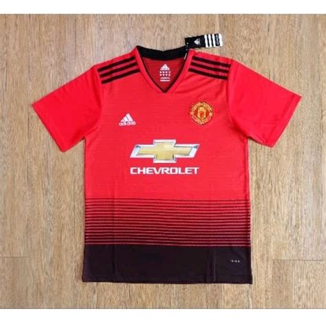 เสื้อฟุตบอลย้อนยุคทีม แมนเชสเตอร์ ยูไนเต็ด ปี2011 12 เกรดaaa Shopee Thailand