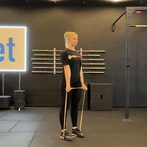 How To Do Resistance Band Curls Muscles Worked And Proper Form Strengthlog