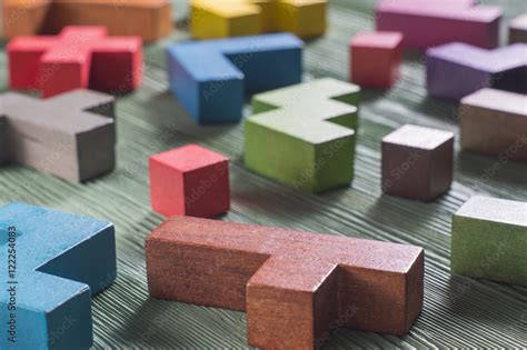 Abstract Construction From Wooden Blocks Tetris Shapes The Concept Of Logical Thinking