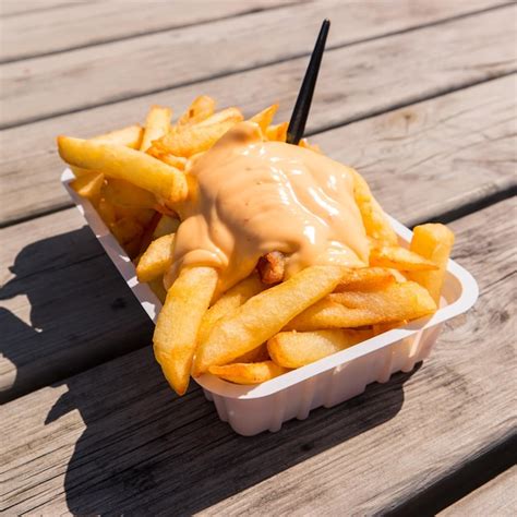 Premium Photo Belgian Fries With Sauce Andalouse