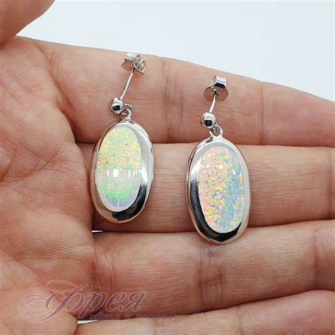 Сребърни обеци плоски с бял опал овал 10х19мм