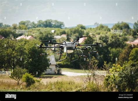 Agricultural Drones Spraying Crops Distribute Pesticides Herbicides And Fertilizers