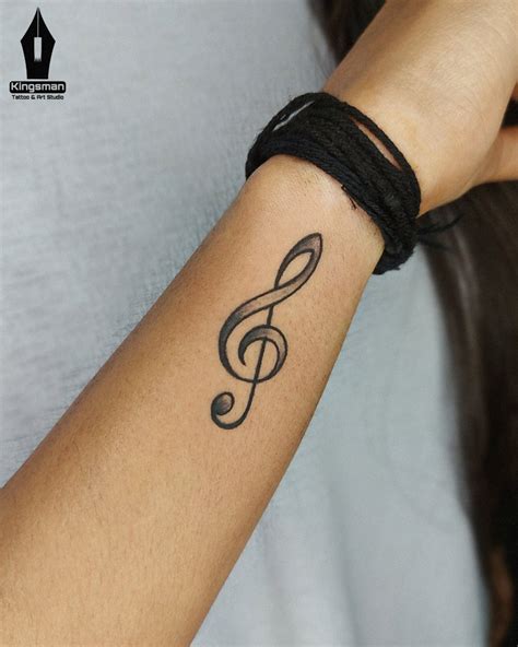 Music Symbol Tattoo Images At Carmen Elliott Blog