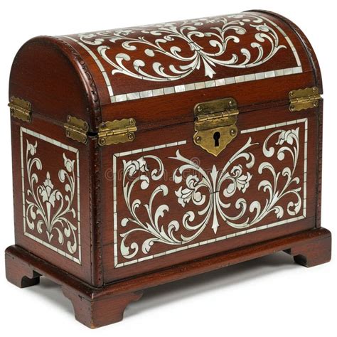 A Decorative Wooden Chest With Ornate White Inlay Patterns Featuring