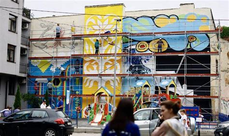 У Львові художники з різних країн створюють великий мурал ФОТО Читайте на Ukr Net