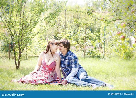 Young Couple In Garden Stock Image Image Of People Beautiful 43959327
