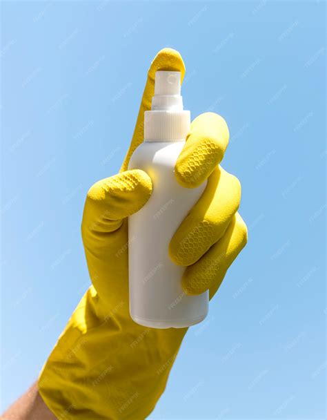 Free Photo Person Using Disinfection Solution