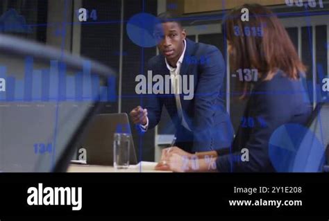 Businessman Presenting Data Financial Statistics Animation Over Office Meeting Presentation