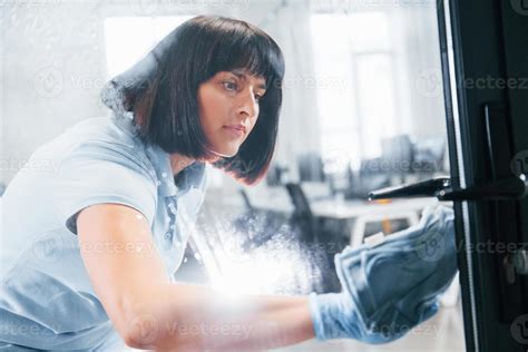 Woman Cleaning Dirty Window By Using Towel View Through The Glass 15361216 Stock Photo At Vecteezy