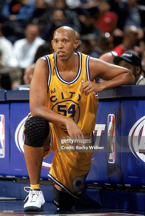 Popeye Jones Of The Golden State Warriors Prepares To Enter The Game