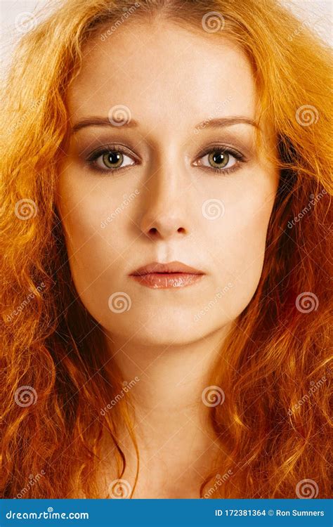 Pretty Girl With Curly Red Hair And Blue Eyes