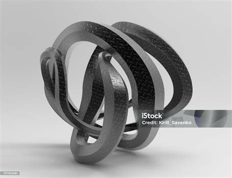 Futuristic Abstract Sculpture Of An Endless Swirling Black Line Of Steel On A White Background