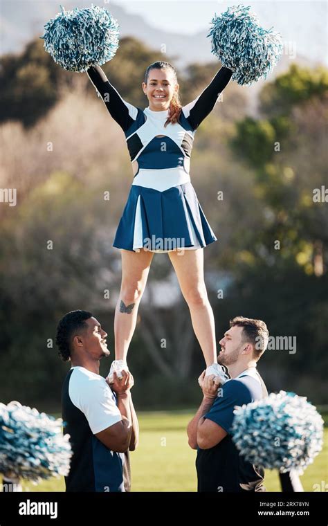 Cheerleader Sports And Men Balance Woman On Field For Performance
