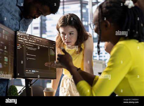 It Staff Members Doing Brainstorming Conducting Tests In Computer To