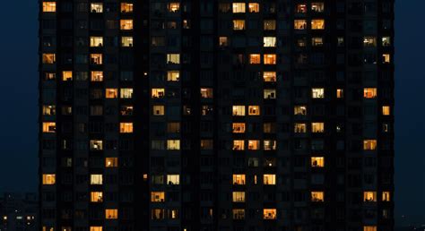 Apartment Building At Night With Illuminated Windows 70869509 Stock