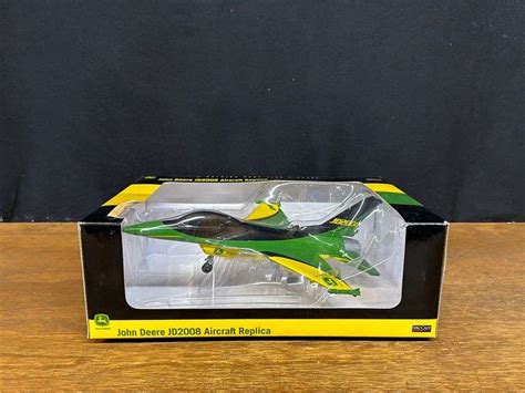 John Deere Airplane Nib Sc Aumann Auctions Inc