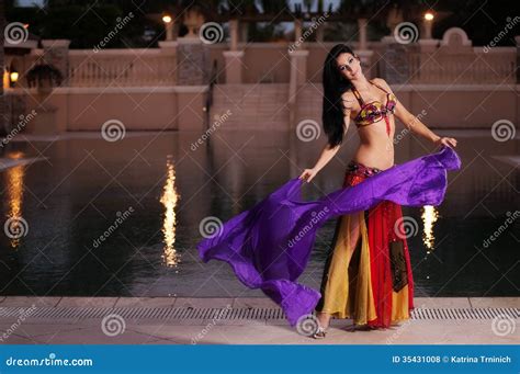 Belly Dancer In Red Costume Dances With Purple Veil Stock Photo Image Of Style Elegance
