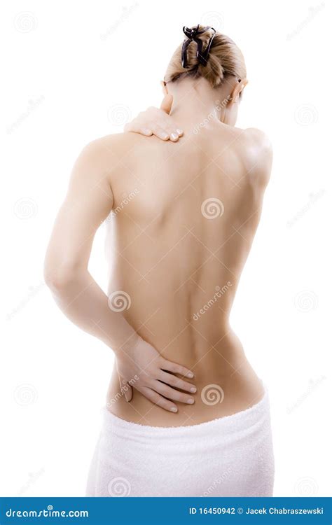 Donna Che Massaggia La Parte Posteriore Di Dolore Fotografia Stock