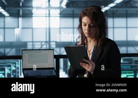 Admin In Data Center Using Artificial Intelligence Tech On Tablet To Deploy New Server