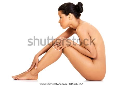 裸の魅力的な女性が座っている側面図白い背景に写真素材186939656 Shutterstock