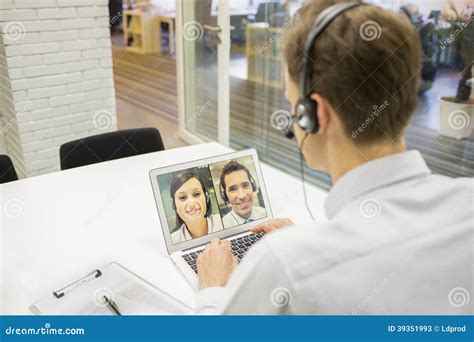 Businessman In The Office On Videoconference With Headset Skype Stock Image Image Of