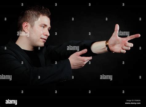 Man Pointing At Something Interesting Stock Photo Alamy