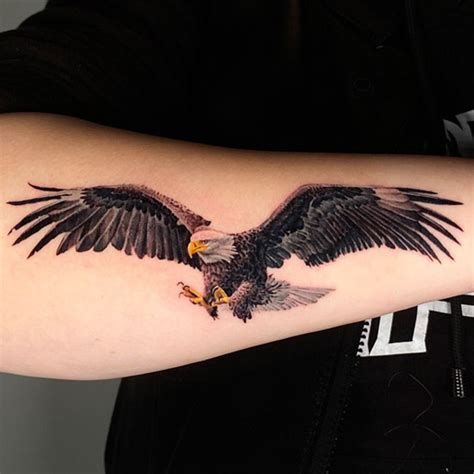 Eagle Traditional Arm Tattoo Symbolism Design And Meaning