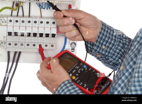 Technician Is Testing An Electrical Device With Instrument Stock Photo Alamy