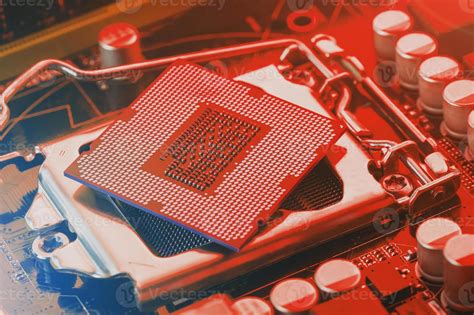 The Central Processor On The Computer Motherboard In Red Colors Stock Photo At Vecteezy
