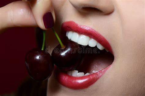 Female Lips Close Up With A Sweet Cherry Stock Image Image Of Fingers