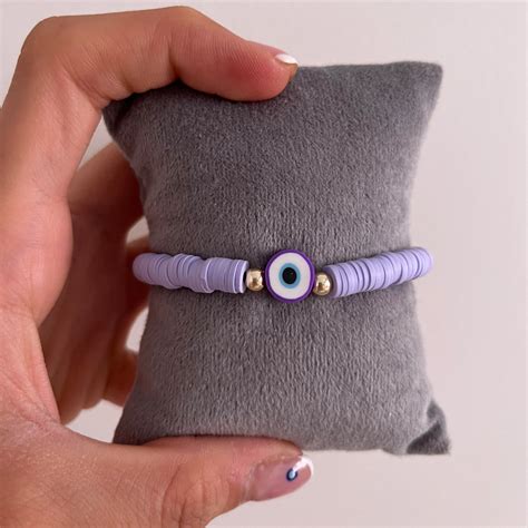 خرید آنلاین و قیمت پابند زنانه مدل فیمو چشم زخم 1403 وکسی