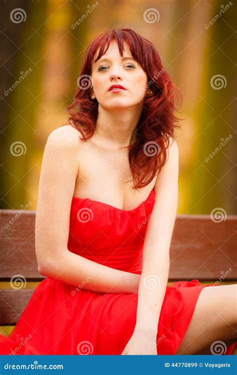 Woman Red Dress Sitting On Bench In Autumn Park Stock Image Image Of
