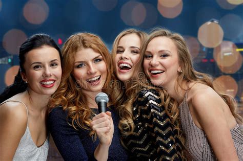 Friends With Microphone Singing At Christmas Party Stock Image Image