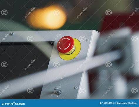 Red Emergency Stop Switch Reset Button On Machinery Industry Stock