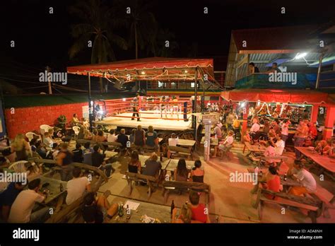 Tourists Watching Thai Boxing In The Open Air Area Of The Reggae Bar Ko
