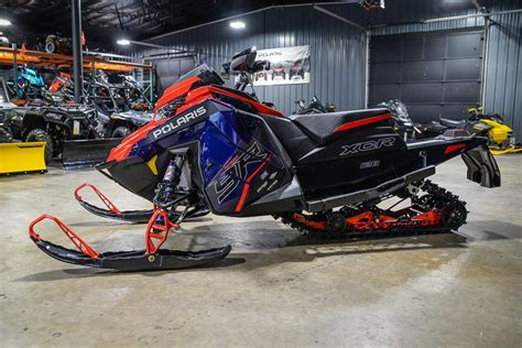 2025 Polaris® 9r Indy Xcr 128 Midnight Blue Metallic Indy Red Engelhart Motorsports