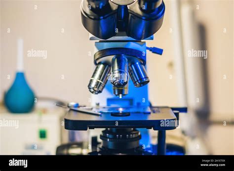 Optical Microscope With Four Different Objective Lenses Stock Photo Alamy