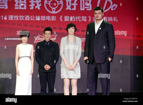 From Right Retired Chinese Basketball Superstar Yao Ming And His Wife