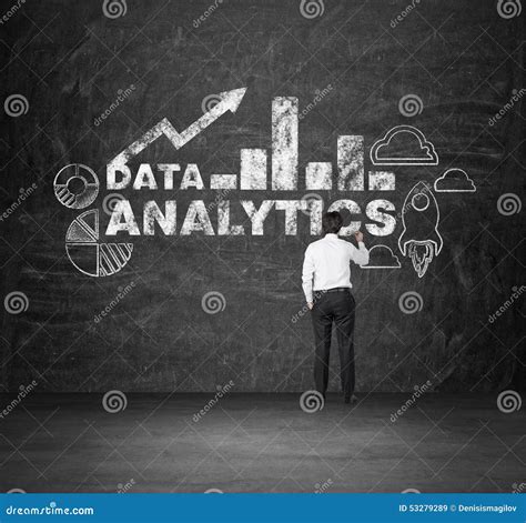 Businessman Is Drawing Analytics Solution On The Black Wall Stock