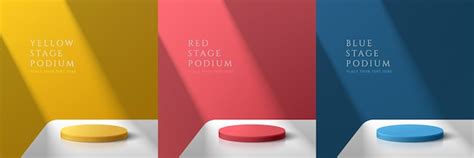 추상적인 방의 흰색 테이블에 있는 노란색 파란색 및 빨간색 실제 3d 실린더 받침대 세트 프리미엄 벡터
